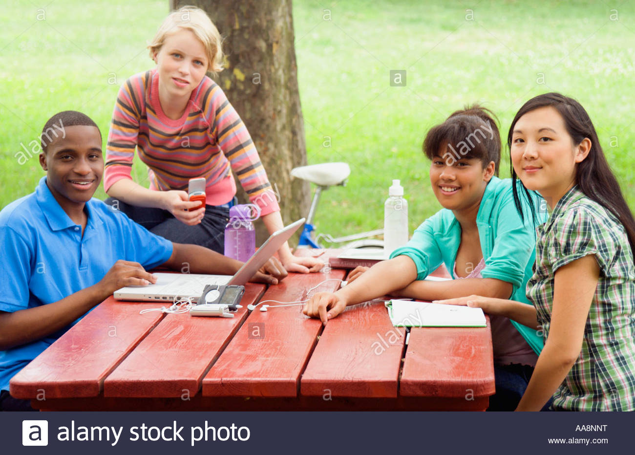 Four Teenagers Talking Stock Photos & Four Teenagers Talking Stock ...