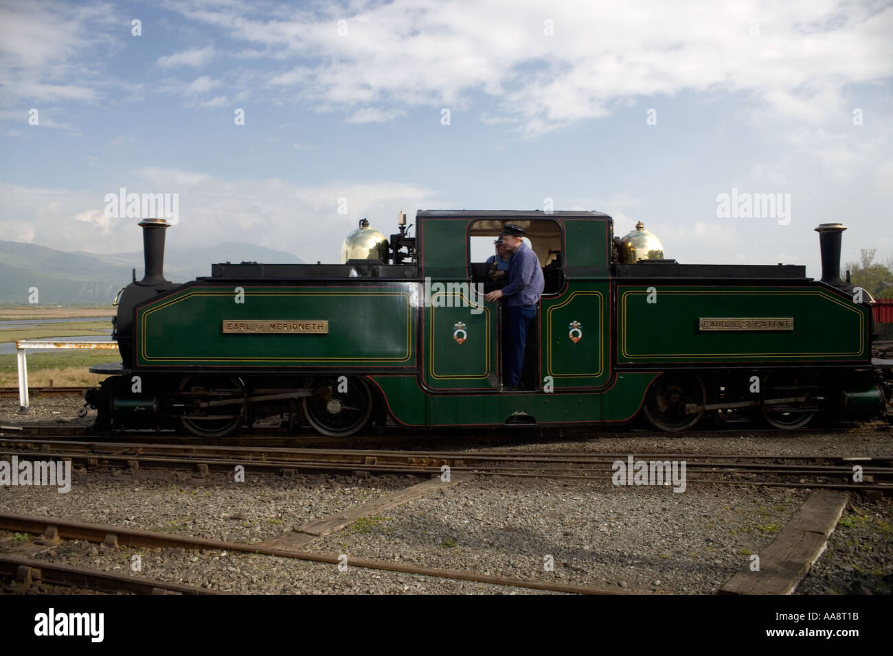 The Earl of Merioneth narrow gauge steam train crossing the cob near ...