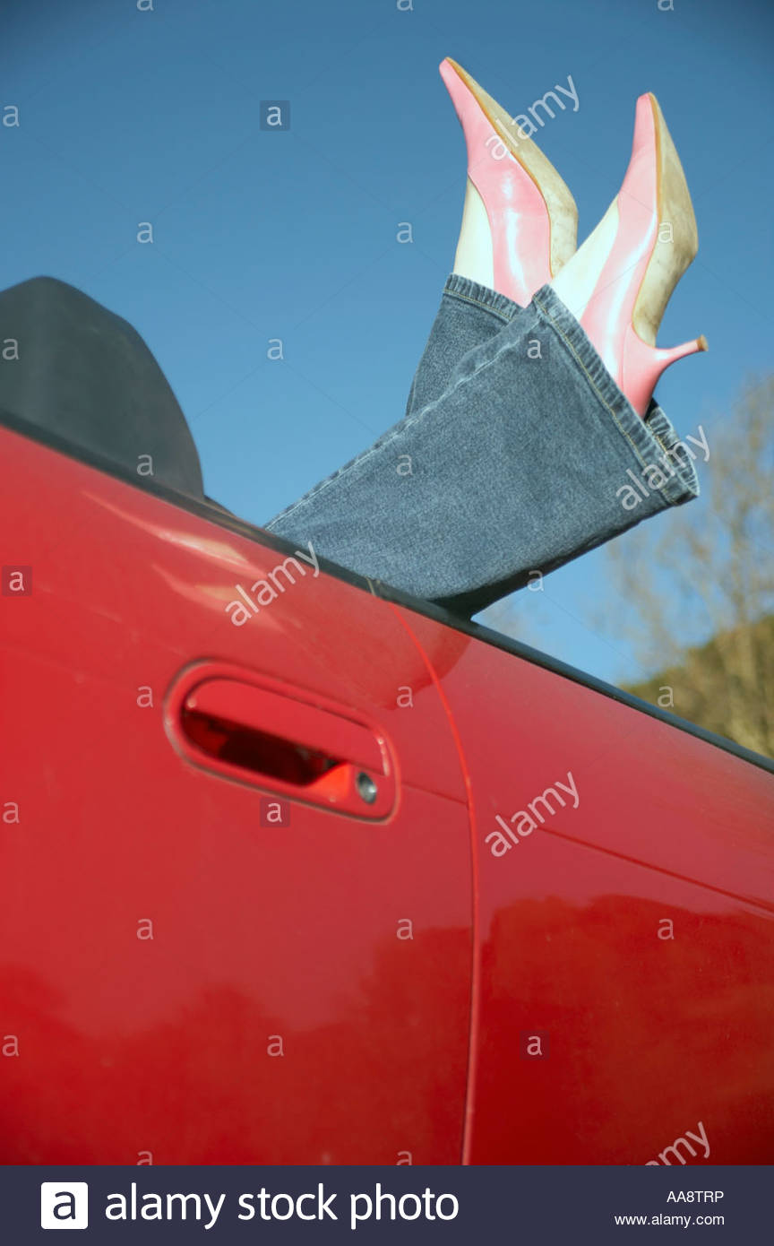 Legs Sticking Out Of Car Stock Photos & Legs Sticking Out Of Car Stock ...