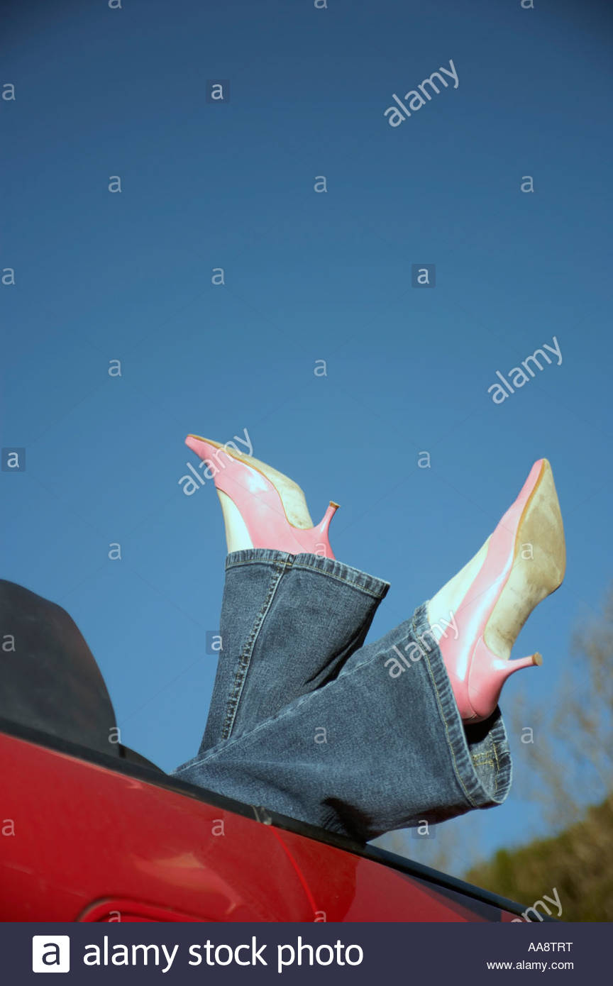 Legs Sticking Out Of Car Stock Photos & Legs Sticking Out Of Car Stock ...