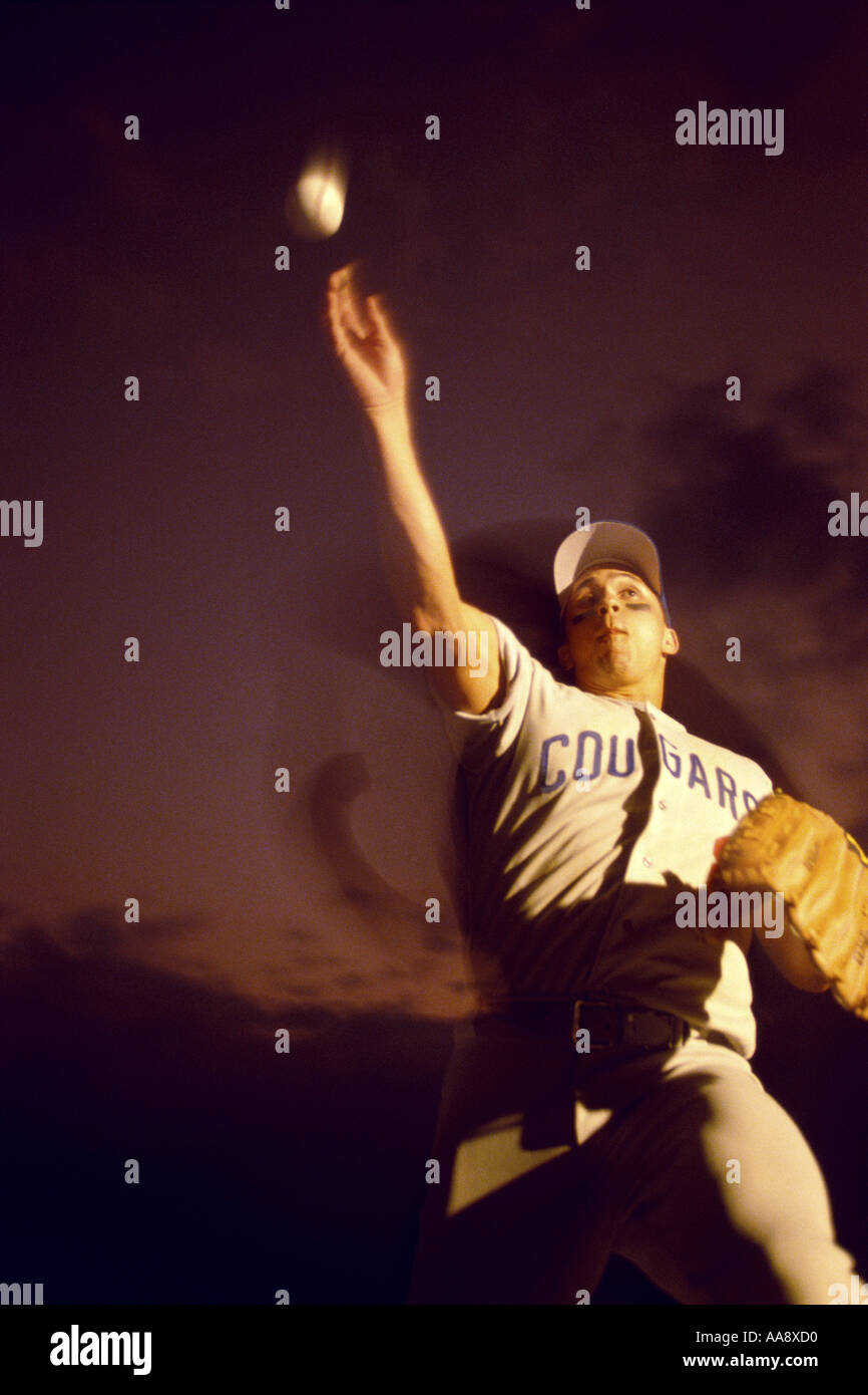 Man throwing a baseball Stock Photo - Alamy