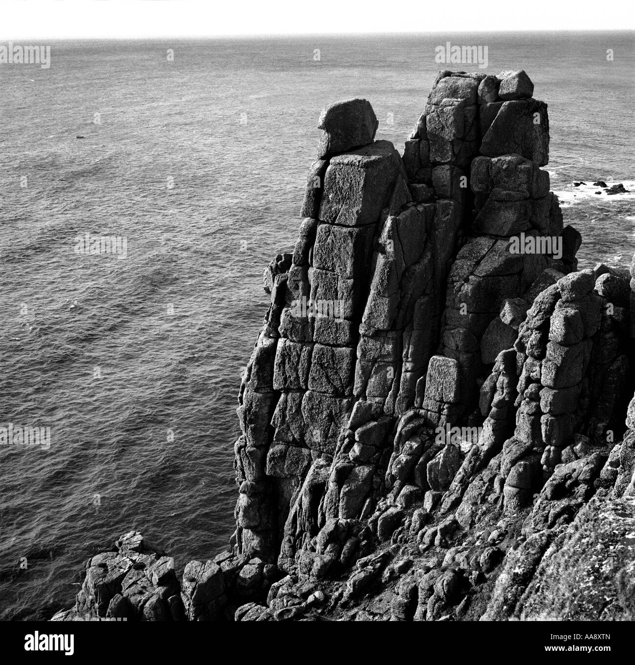 Picture shows the famous rock formation of Land's End, Cornwall, along ...