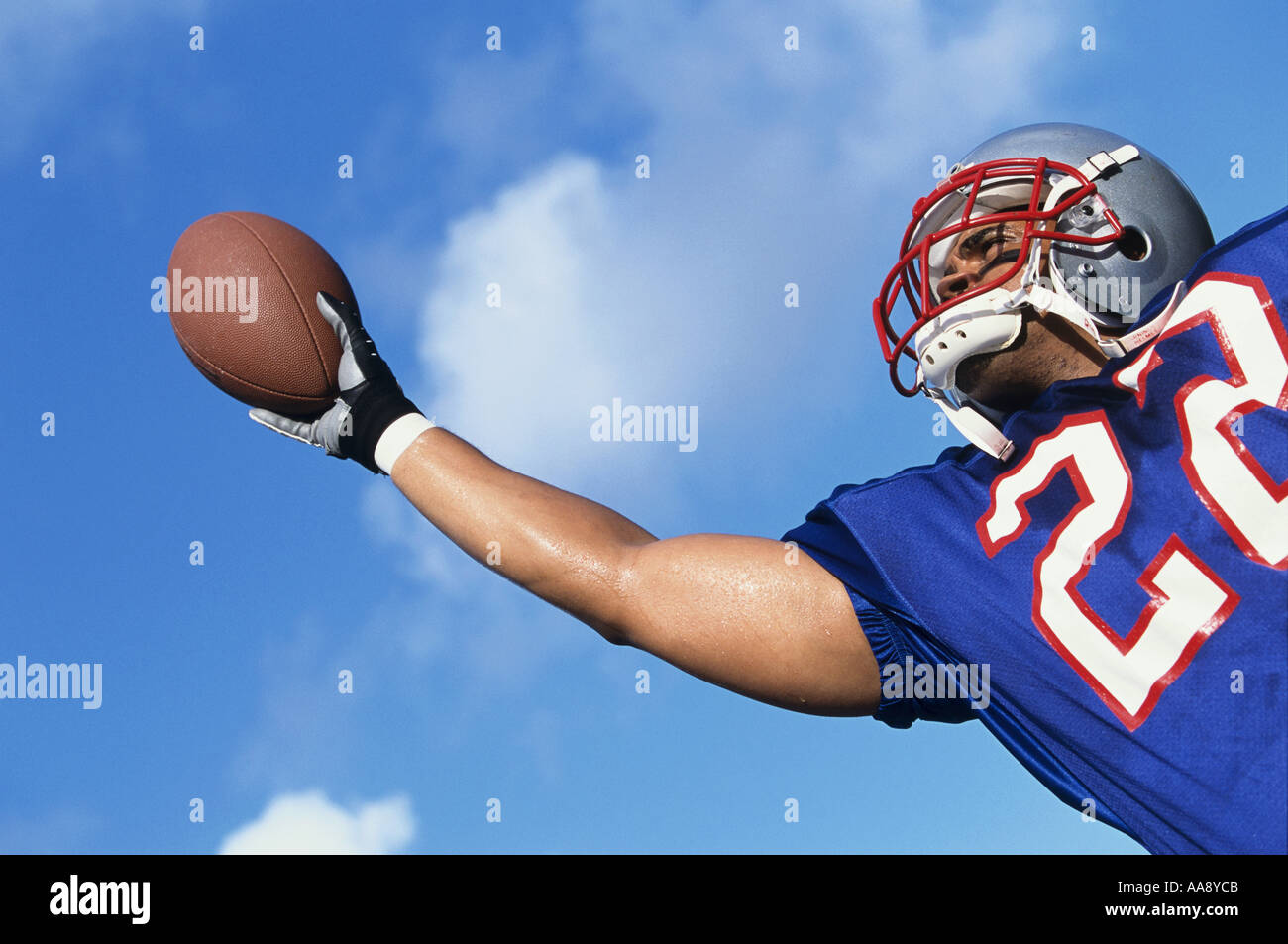 Football player catching ball in hi-res stock photography and images ...