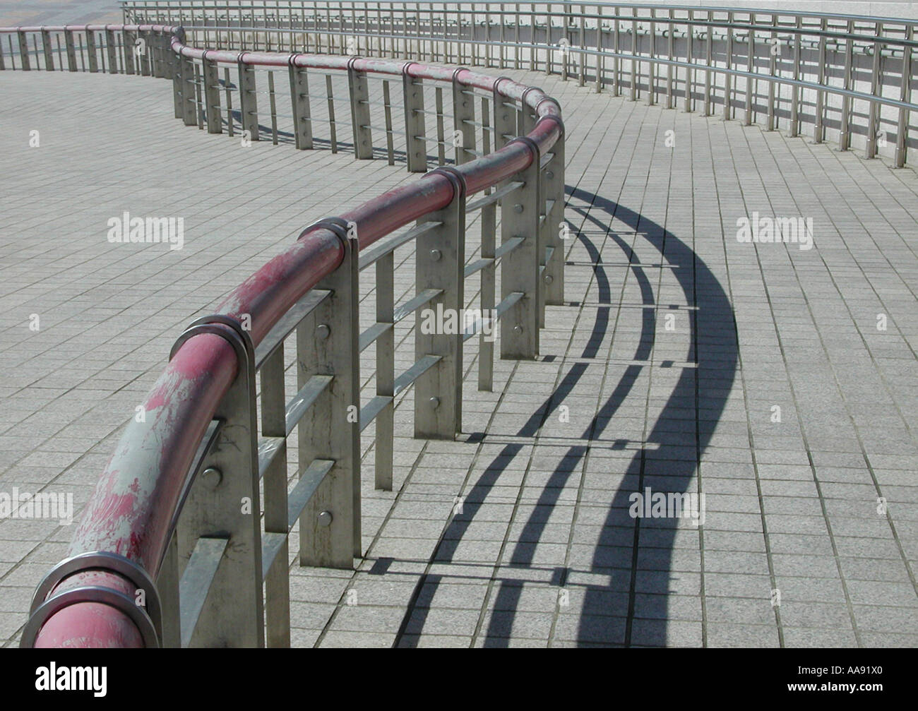 handrail and paved walk Stock Photo - Alamy