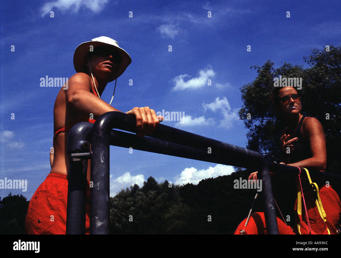 Two female lifeguards on duty at Kenwood Ladies Pond Hampstead Heath ...