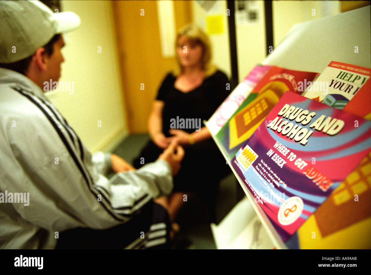 Young offender talking to his probation officer Stock Photo - Alamy