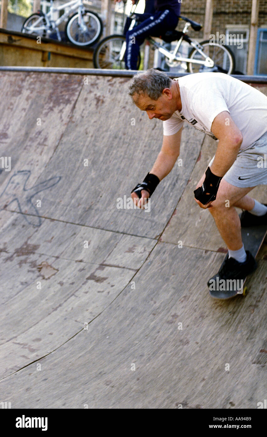 An older man skateboarding at a skate park in Bromley South London ...