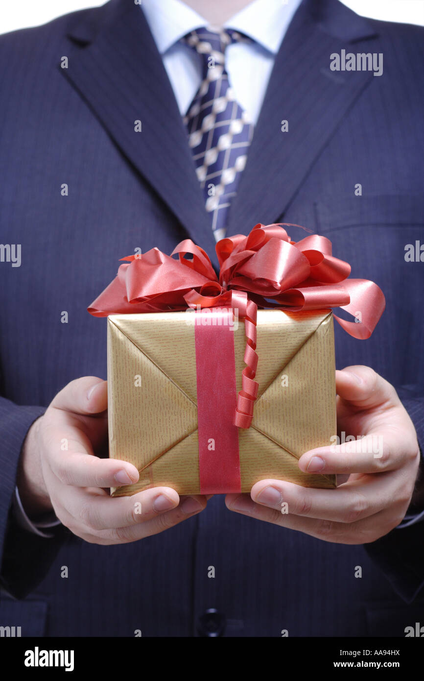 Man holding a box Stock Photo - Alamy