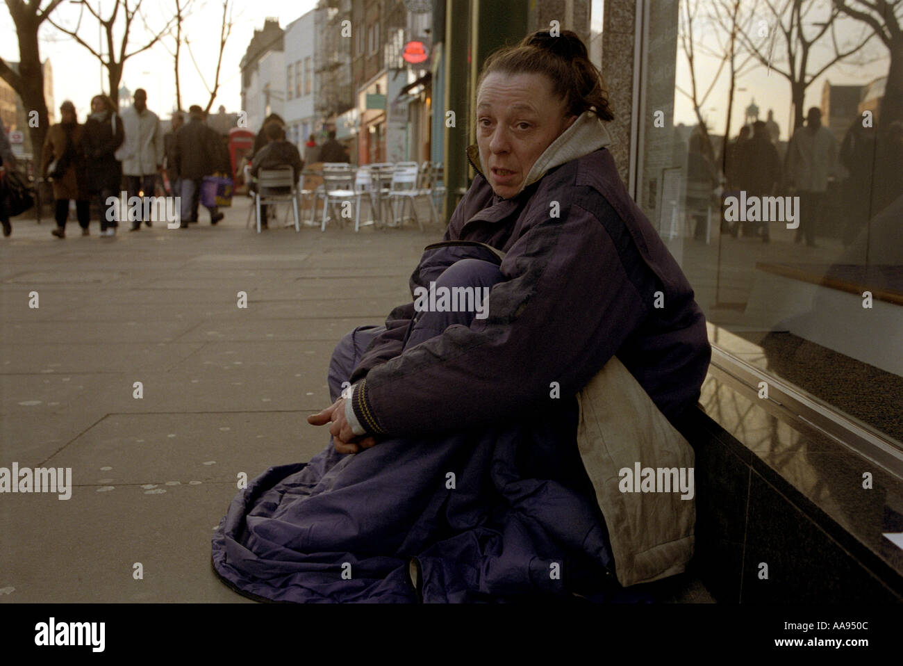 Homeless woman begging in Islington North London Stock Photo - Alamy