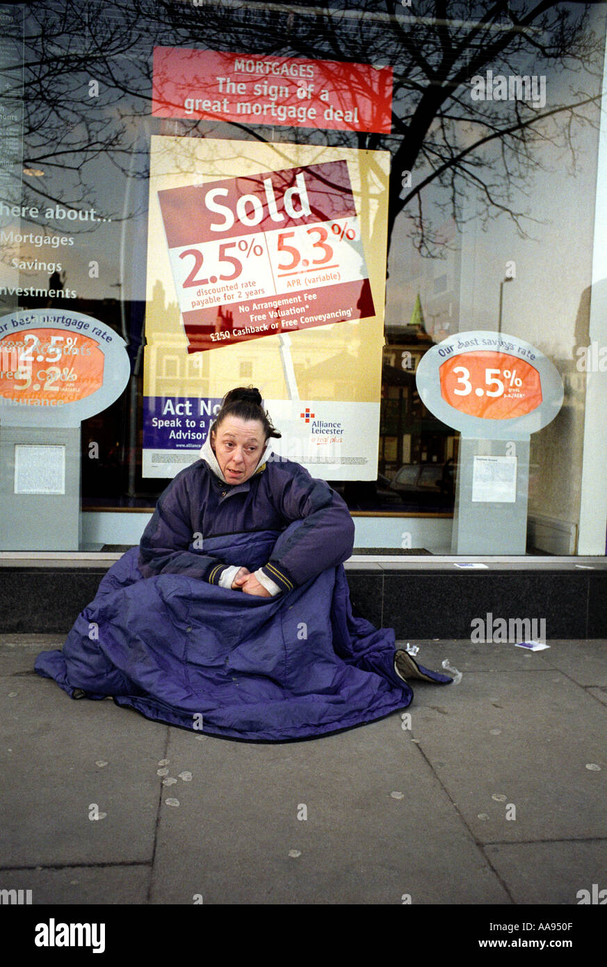 Homeless woman begging in Islington North London Stock Photo - Alamy