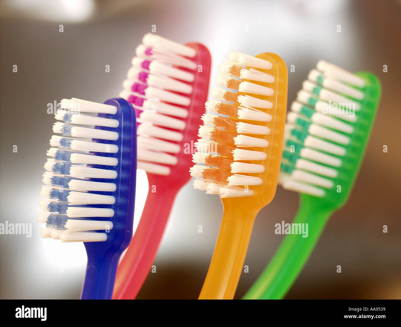 Coloured tooth brushes hi-res stock photography and images - Alamy