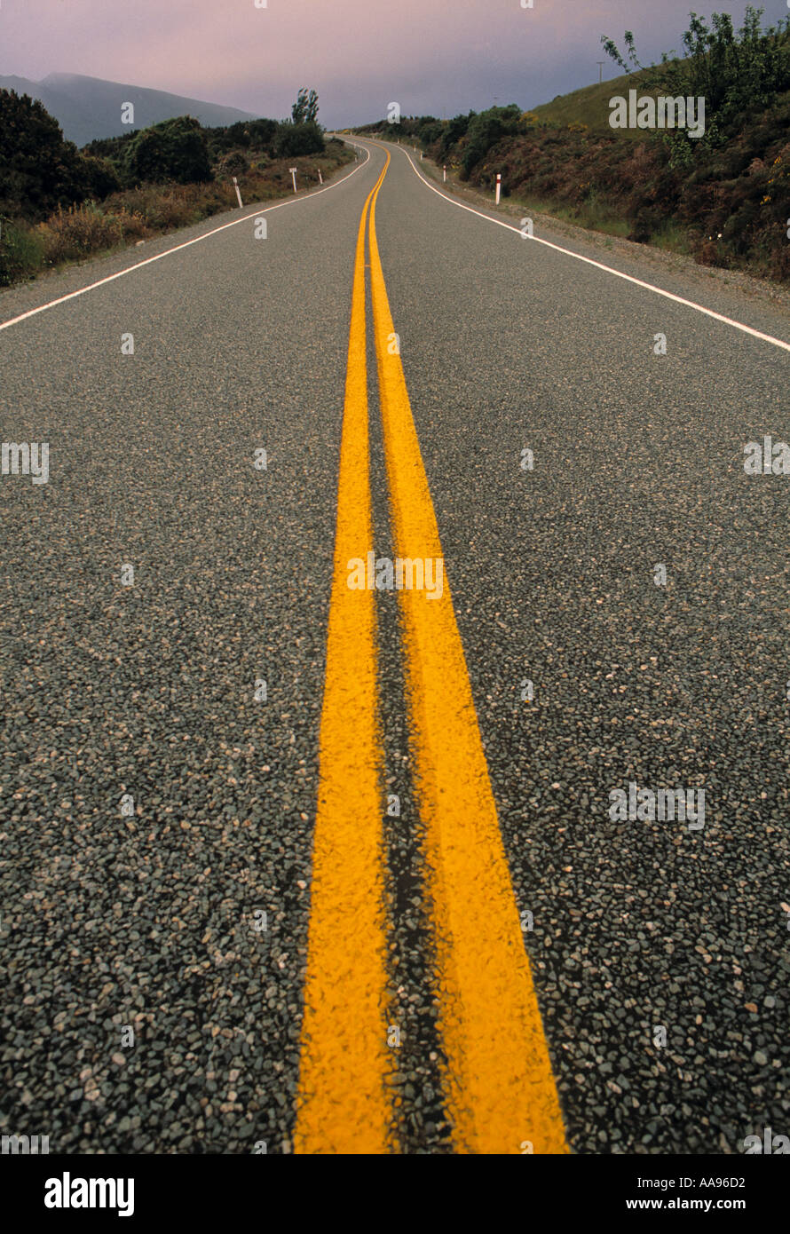 Yellow lines on road Stock Photo - Alamy