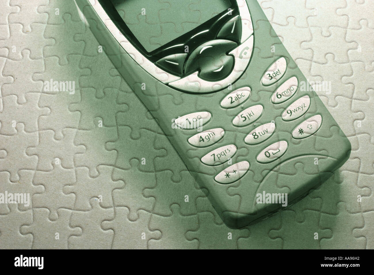 Mobile Phone and Jigsaw Puzzle Stock Photo - Alamy
