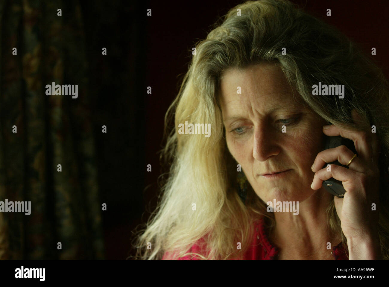 Woman in conversation. serious hi-res stock photography and images - Alamy