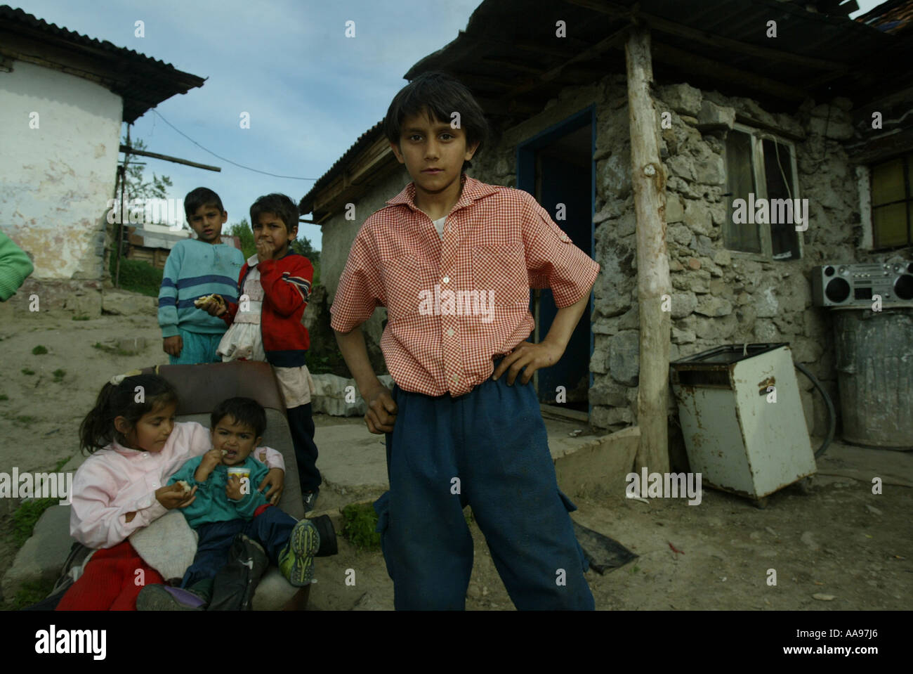 A ROMA GYPSY BOY ON A CAMP IN KOSICE SLOVAKIA IN 2004 Stock Photo - Alamy