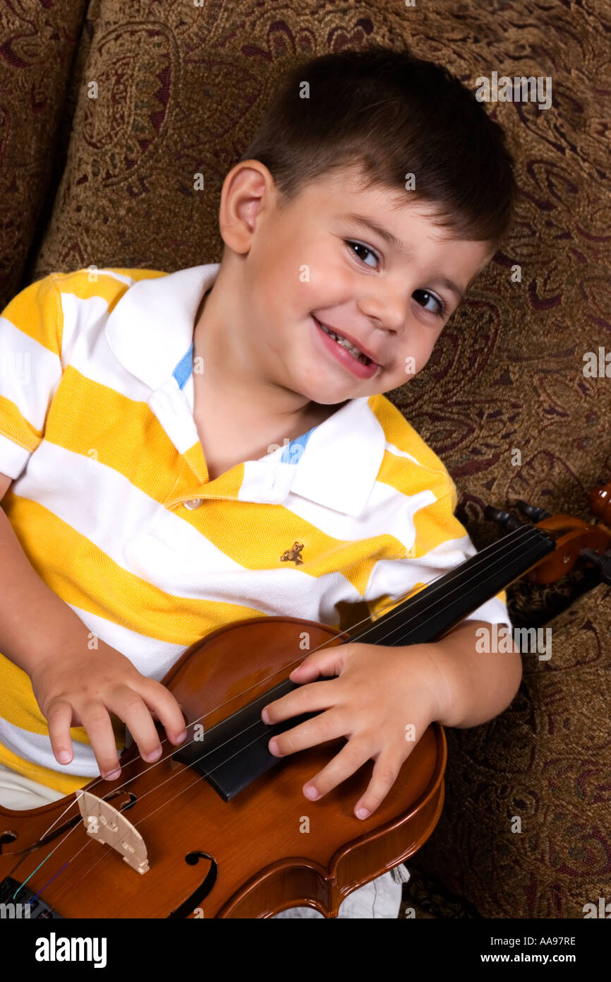 Two year old playing violin fiddle Stock Photo - Alamy