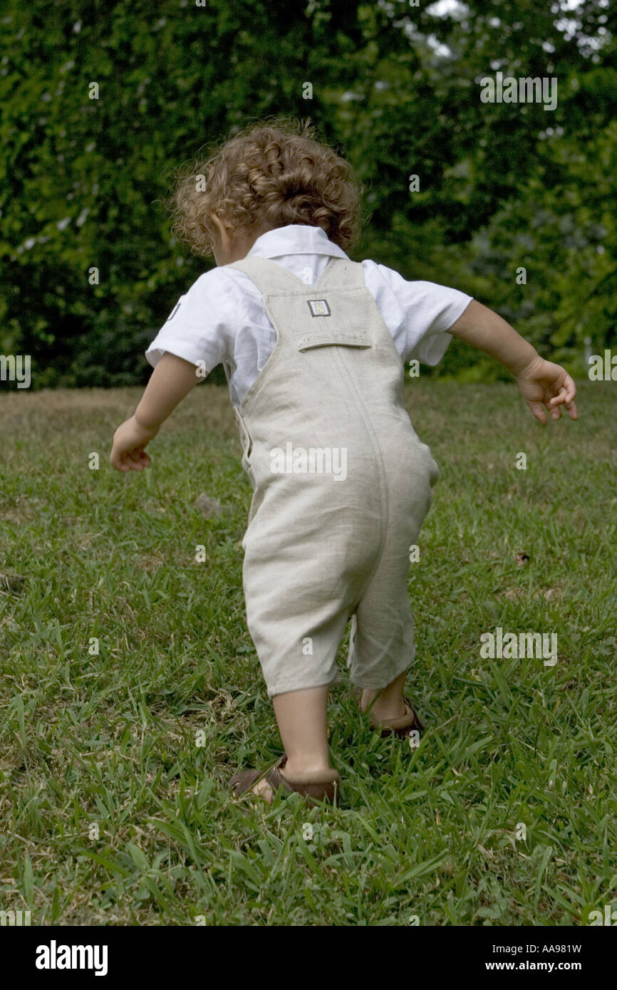 Baby boy taking some of his first steps MR Stock Photo - Alamy