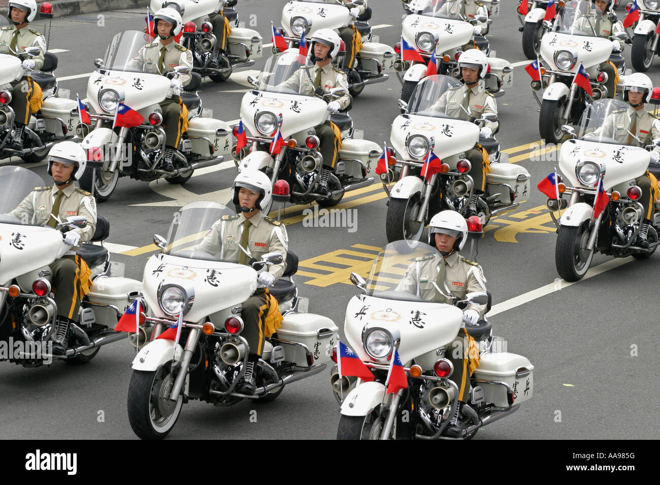 A fleet of Taiwan's military police rides motorcycles parade during an ...