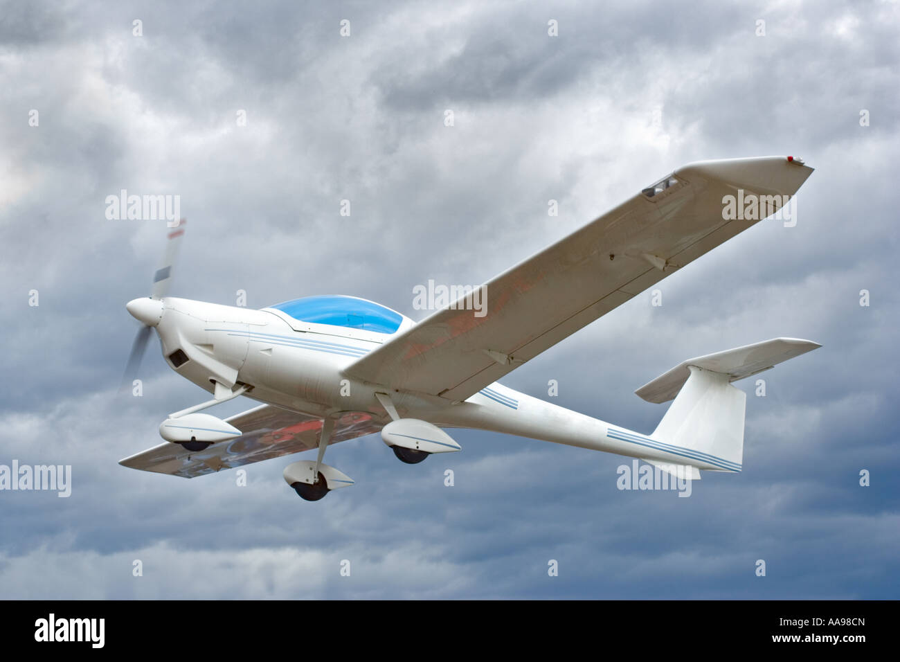 Small private plane in flight Stock Photo - Alamy