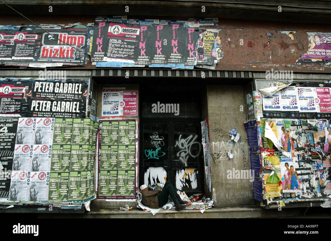 A HOMELESS MAN SLEEPS ROUGH IN A DERELICT BUILDING IN BUDAPEST HUNGARY ...