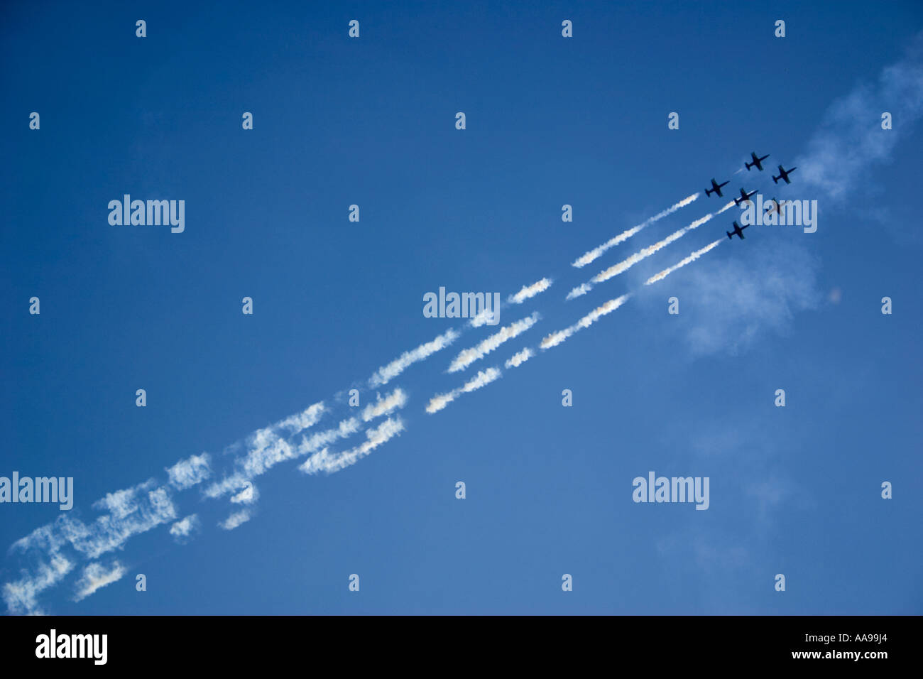Group fly of jet aircrafts in sky Stock Photo - Alamy