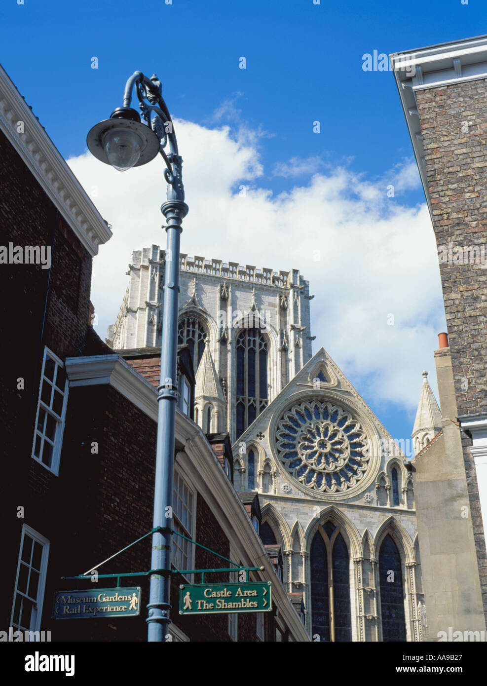 Rose window and southern facade of medieval York Minster from Stonegate ...