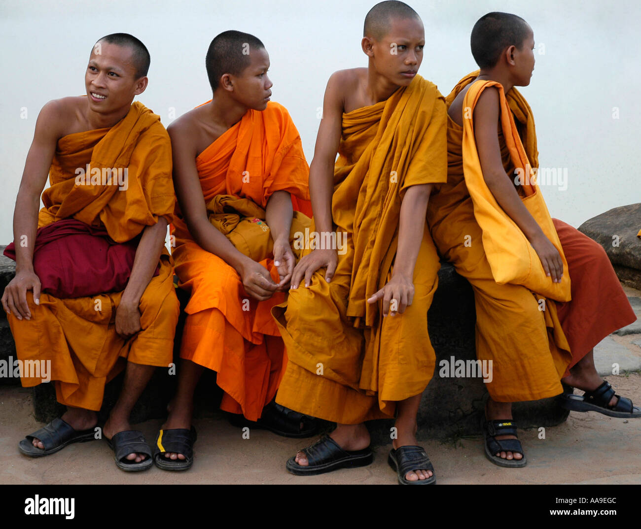 A group of monks outside Angkor Wat, Siem Reap, Cambodia Stock Photo ...