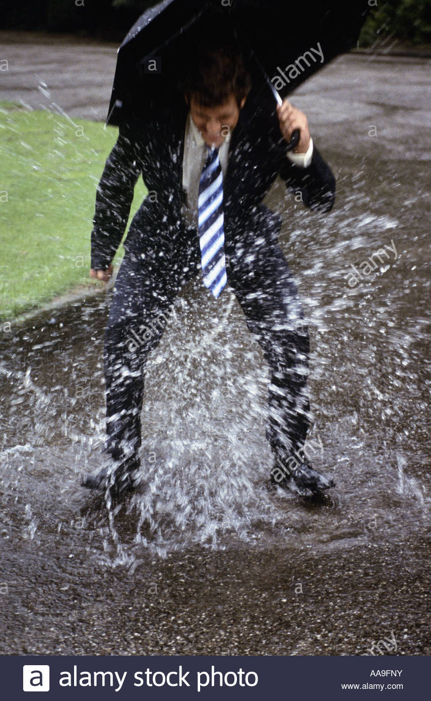 Splash Puddle Adult Stock Photos & Splash Puddle Adult Stock Images - Alamy