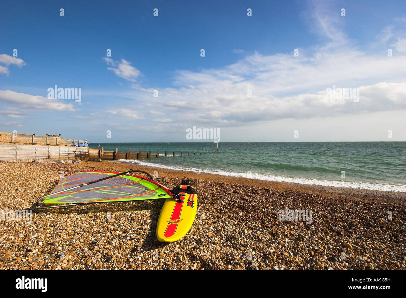 windsurfer on beach Stock Photo - Alamy