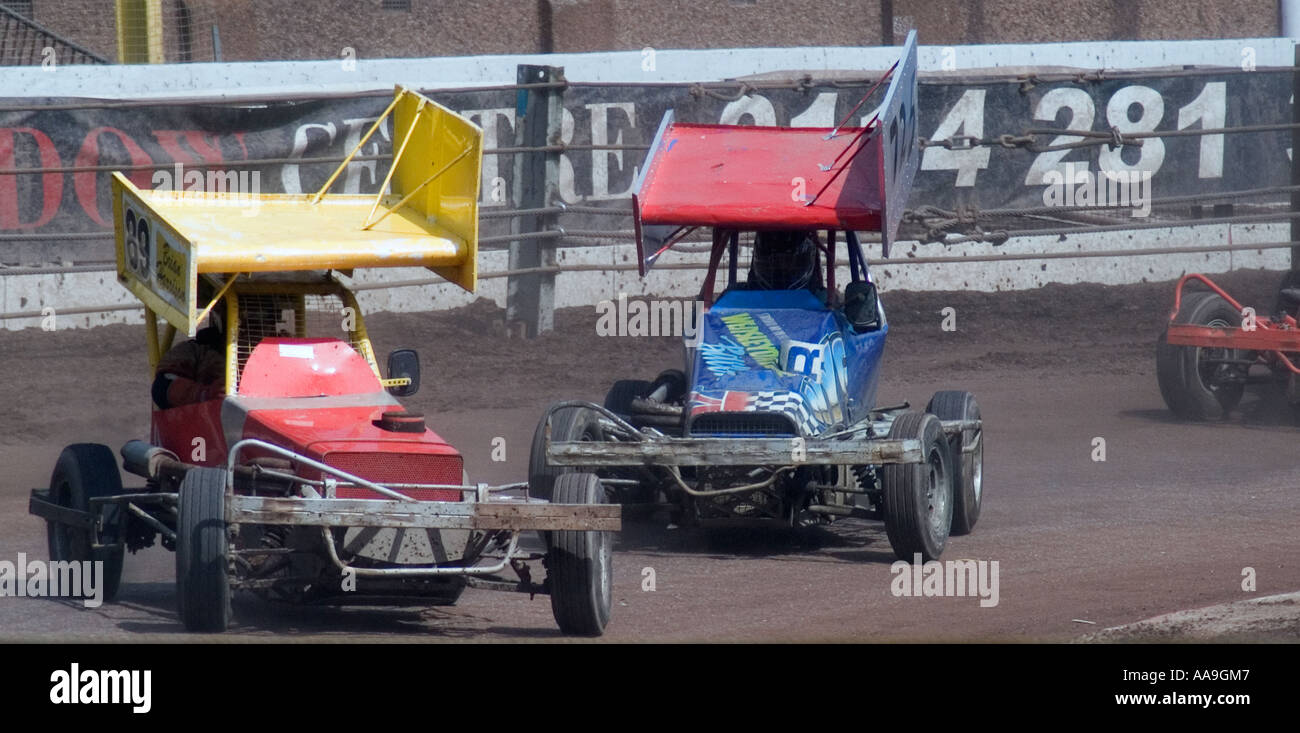 Two stock cars on a dirt race circuit go wheel to wheel Stock Photo - Alamy