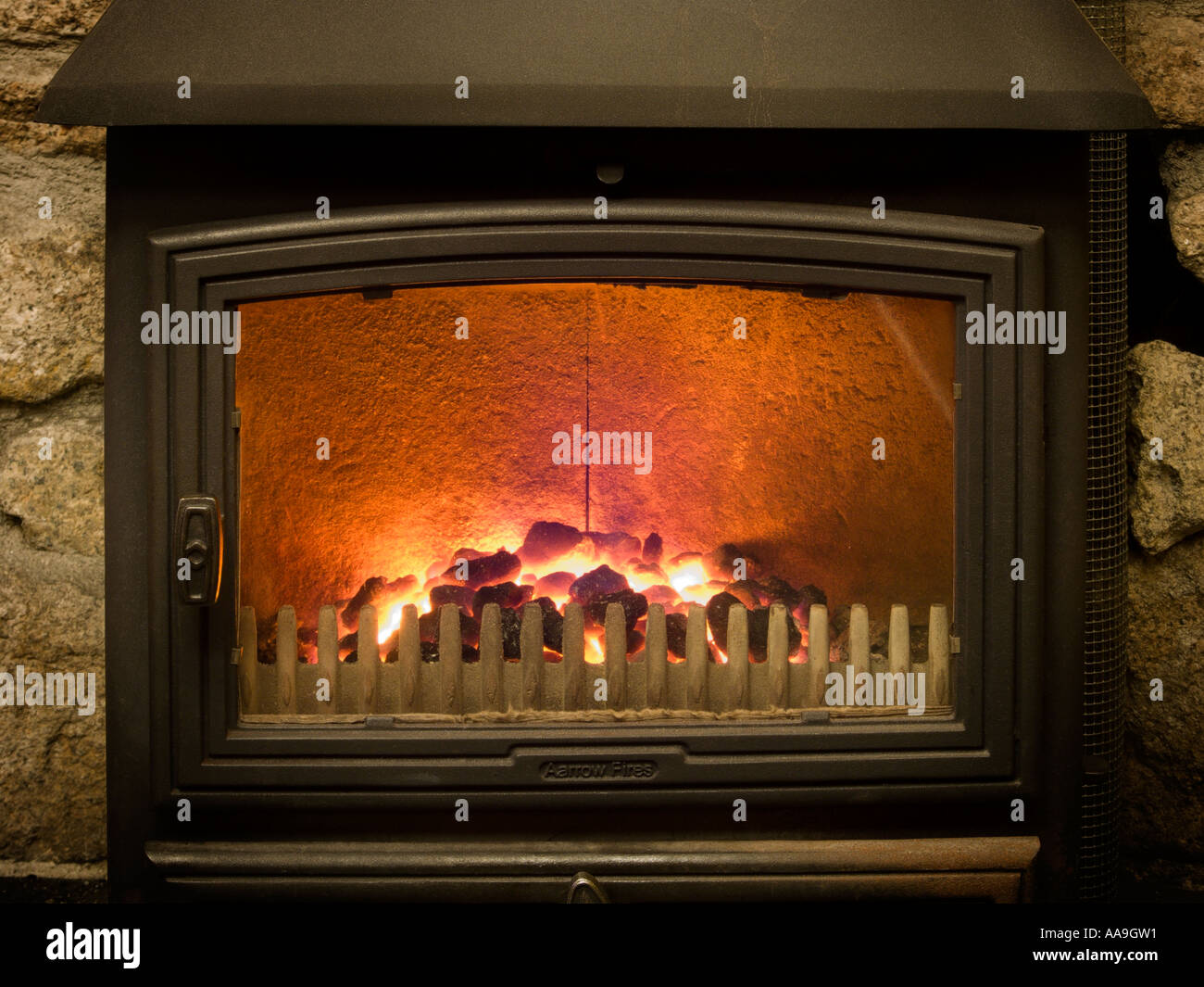 Cottage style stove burning coal Stock Photo - Alamy