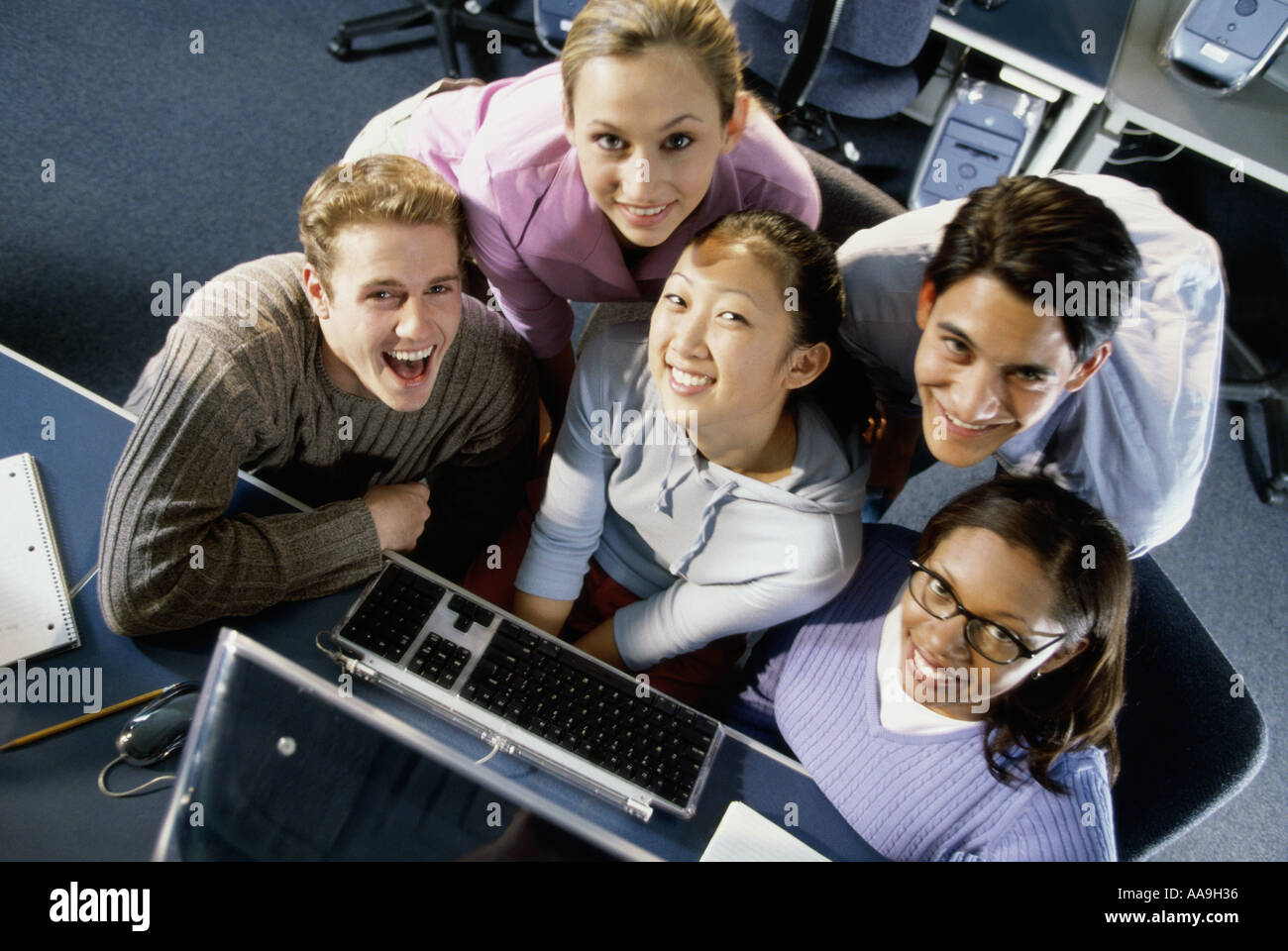Portrait of a group of young people smiling Stock Photo - Alamy