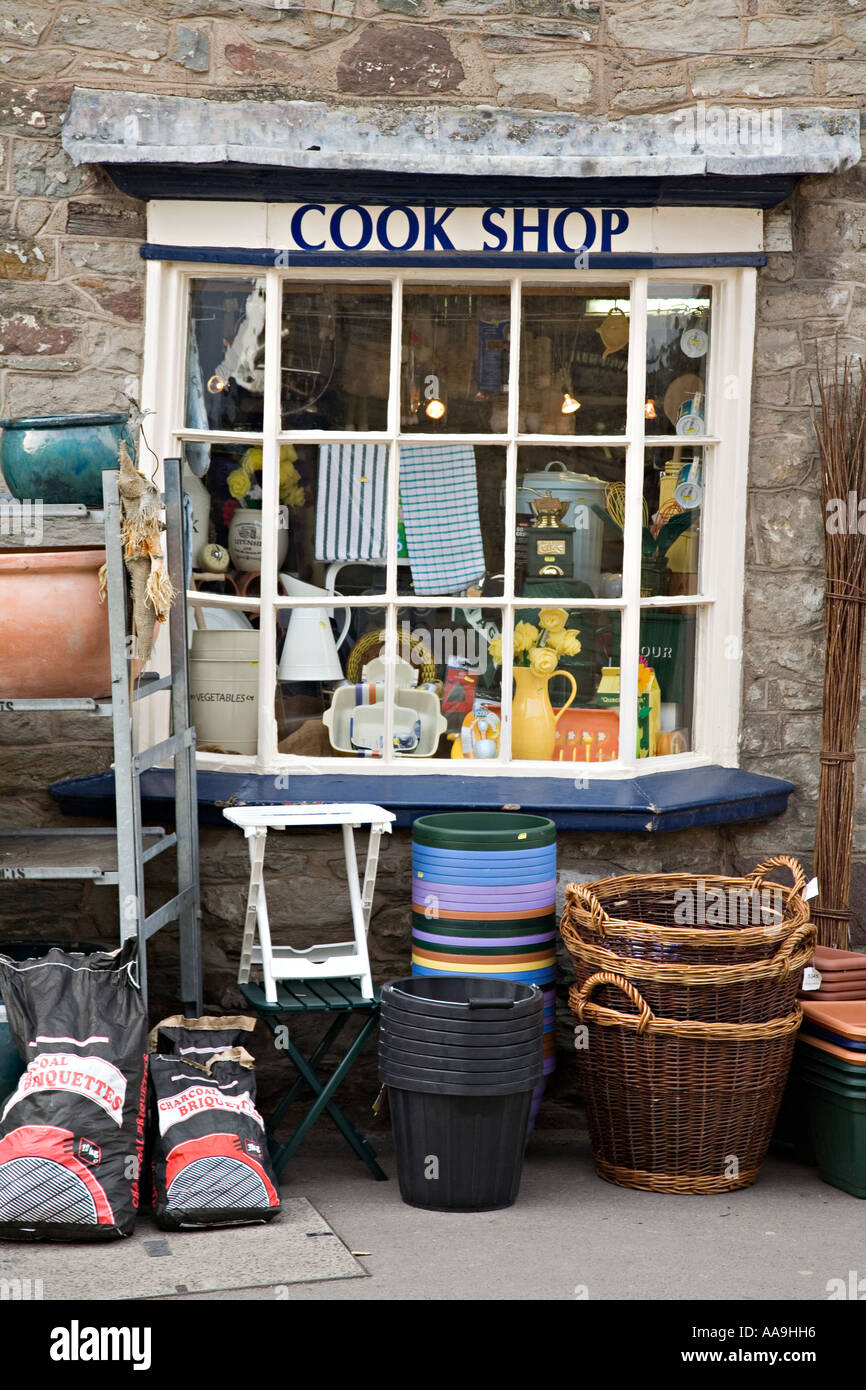 Cook shop with kitchen and ironmonger utensils on sale on pavement and ...