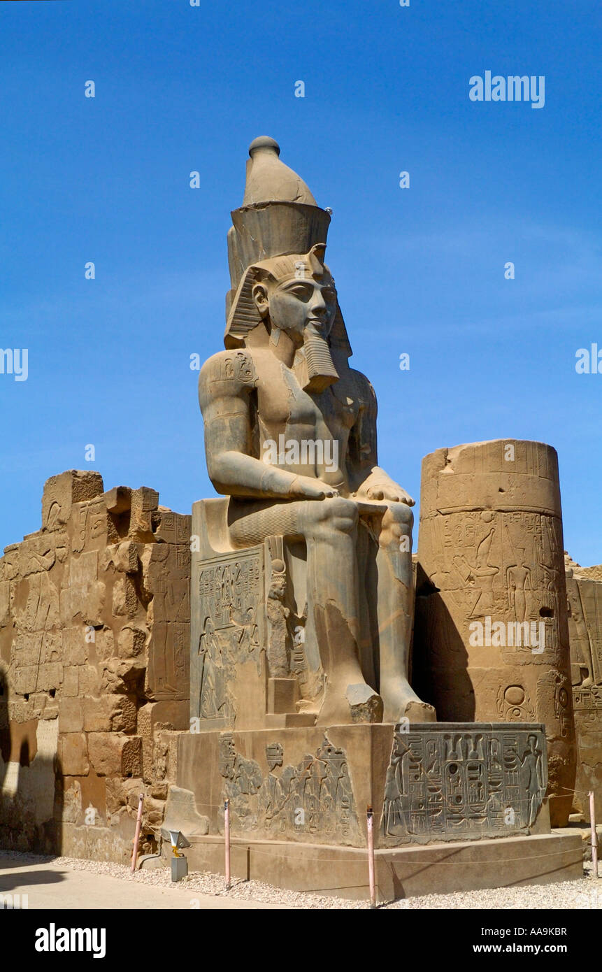 One of two colosal seated statues of Rameses II that sit at the ...