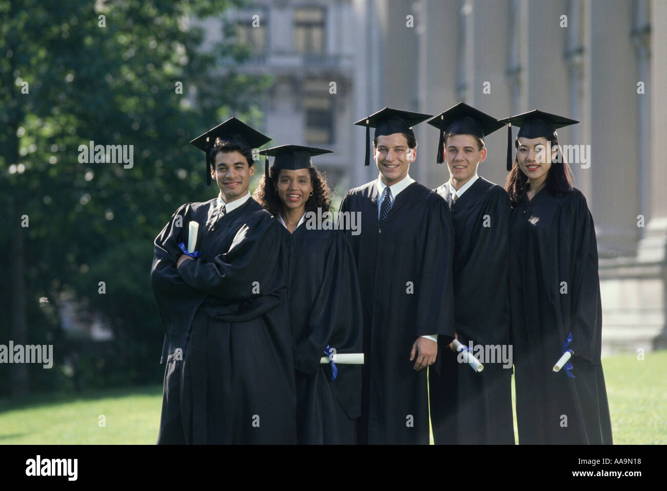 Portrait group students wearing graduation hi-res stock photography and ...