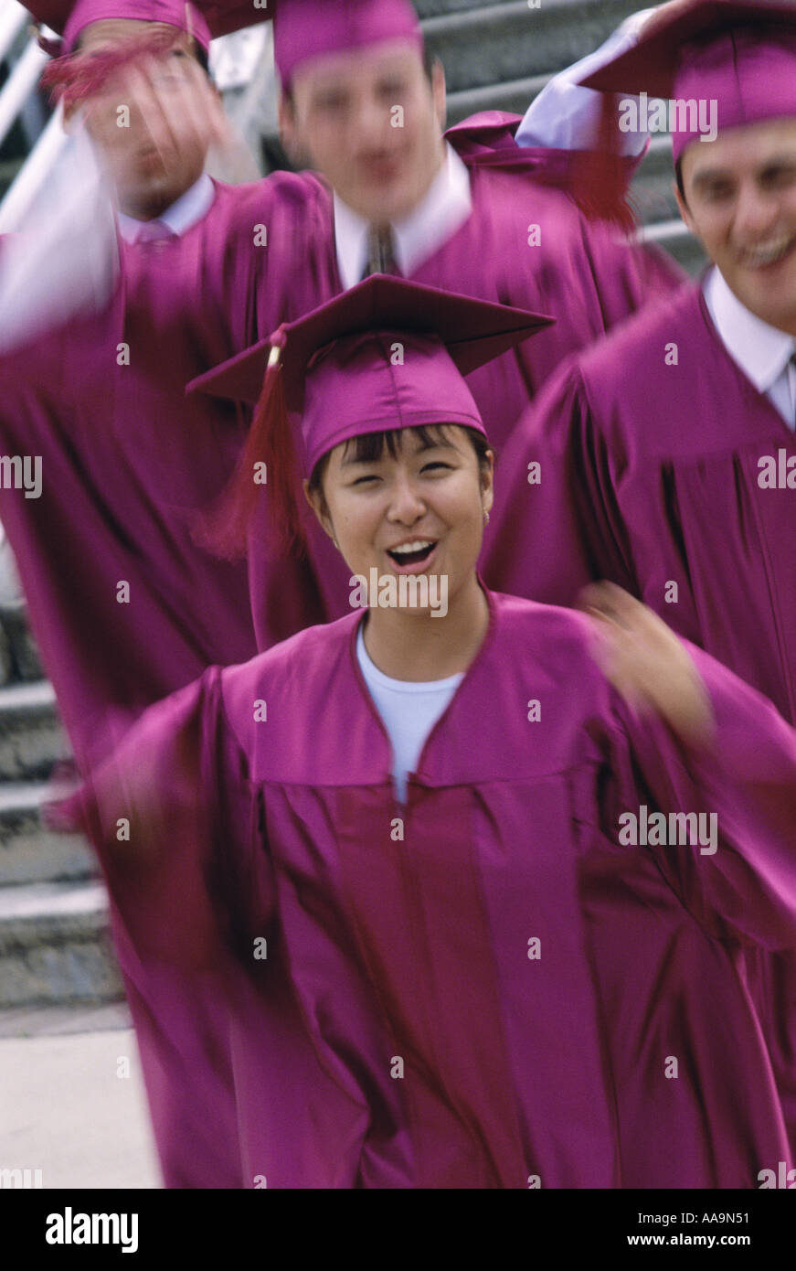 Portrait of students wearing their graduation outfits Stock Photo - Alamy