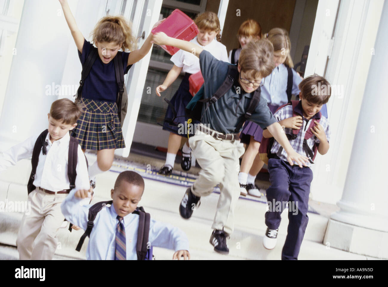 School children leaving the school building Stock Photo - Alamy