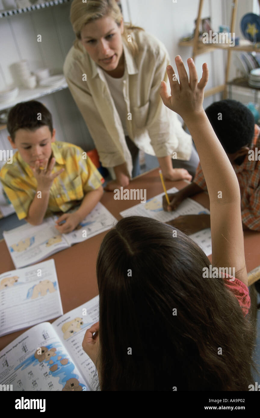 High school girl raising hand hi-res stock photography and images - Alamy