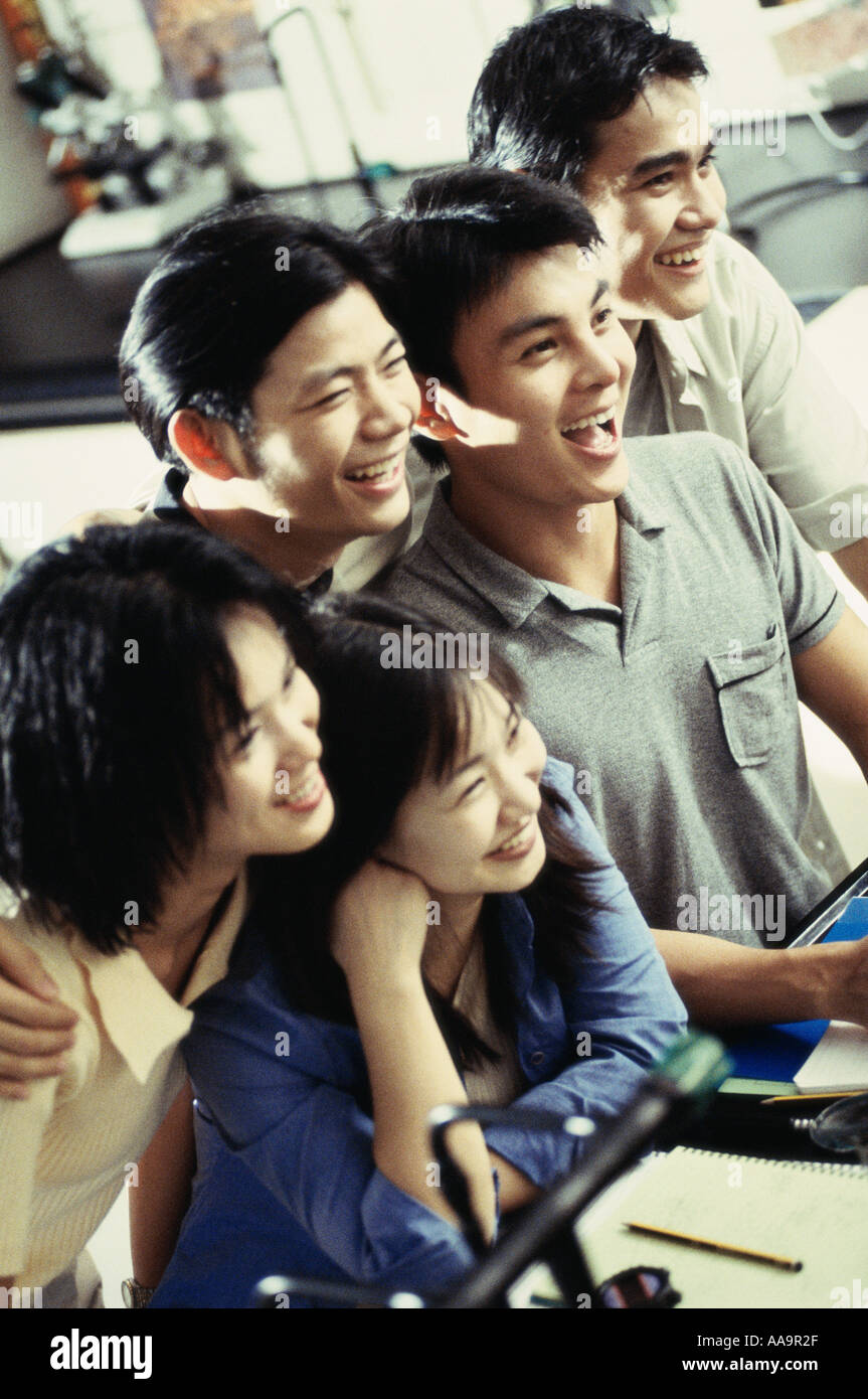 Teenage students laughing Stock Photo - Alamy