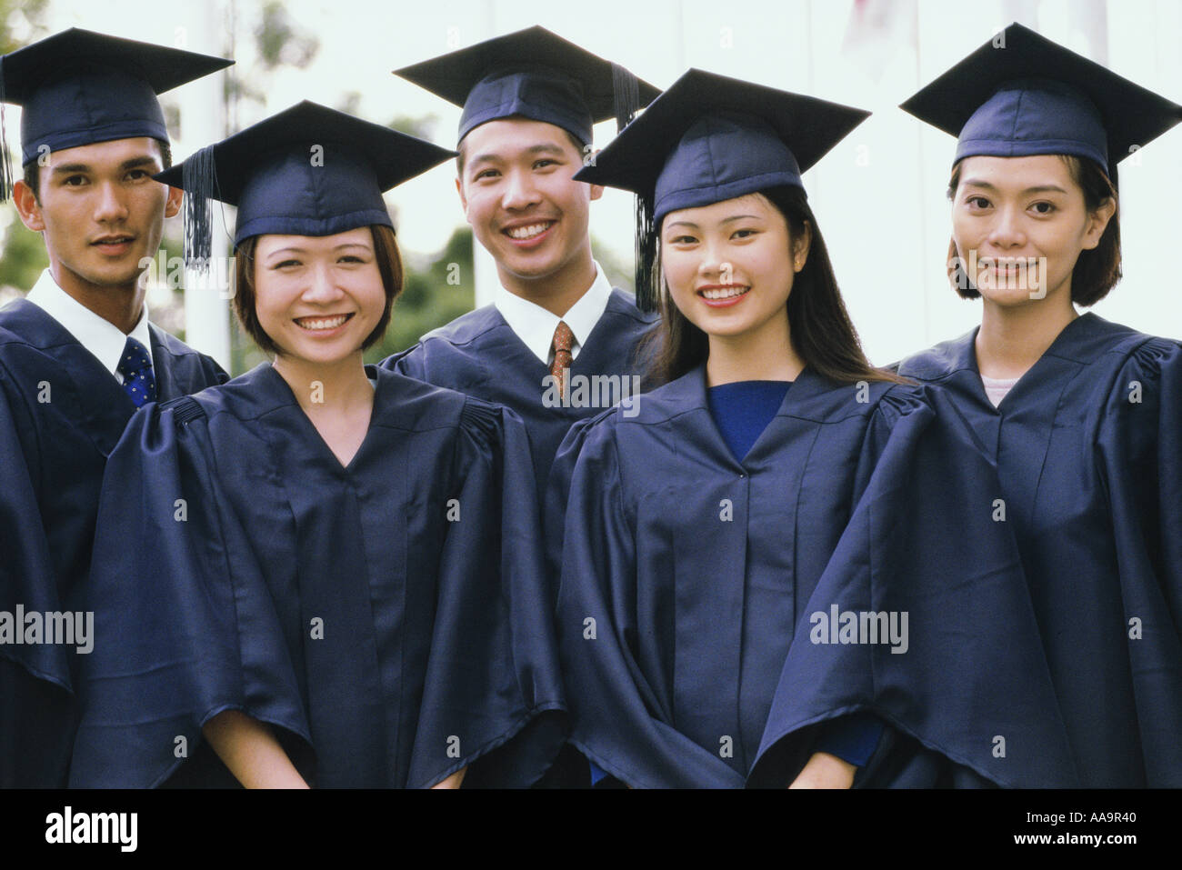 Portrait group students wearing graduation hi-res stock photography and ...