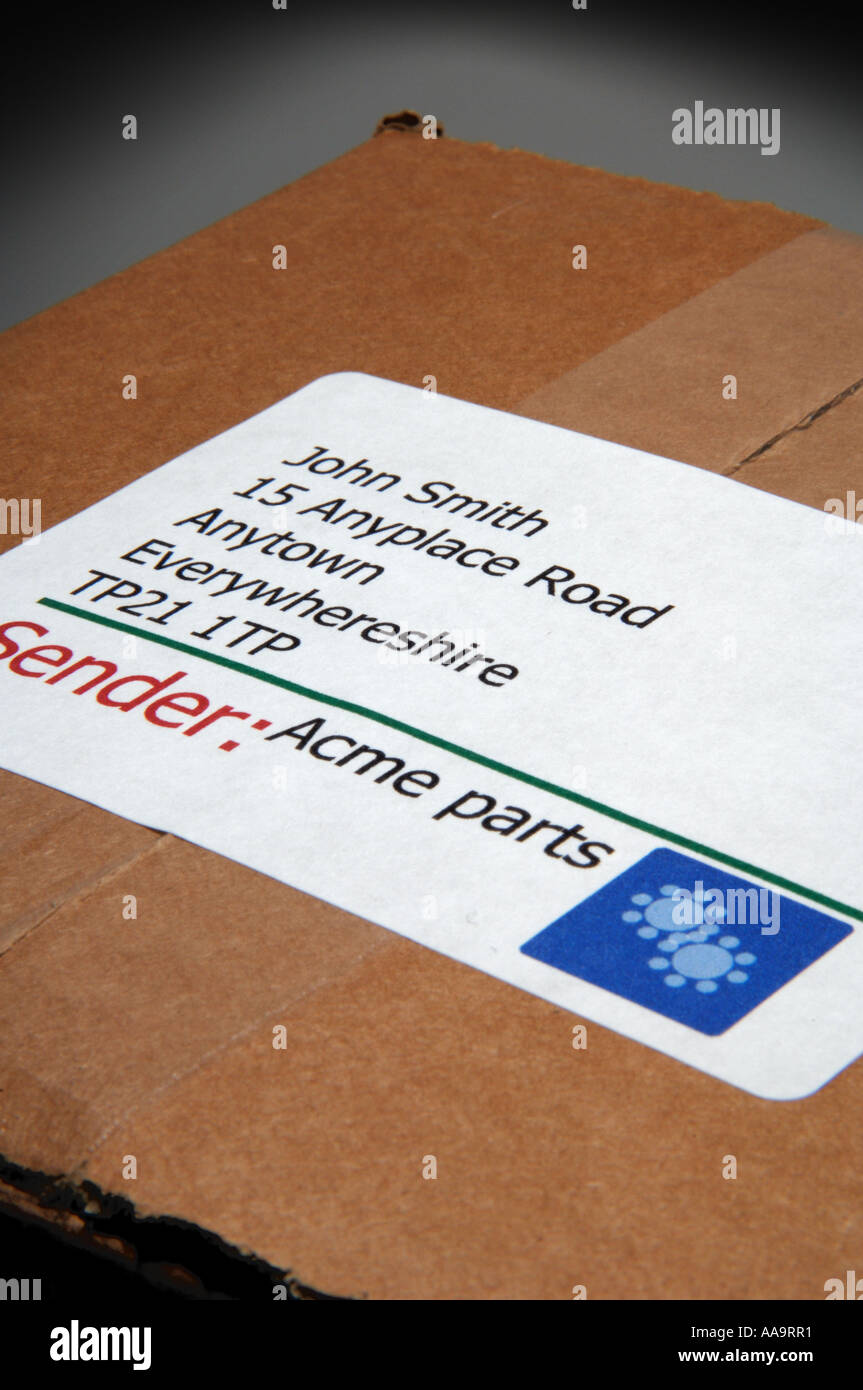 Close up of address label on a cardboard package Stock Photo - Alamy