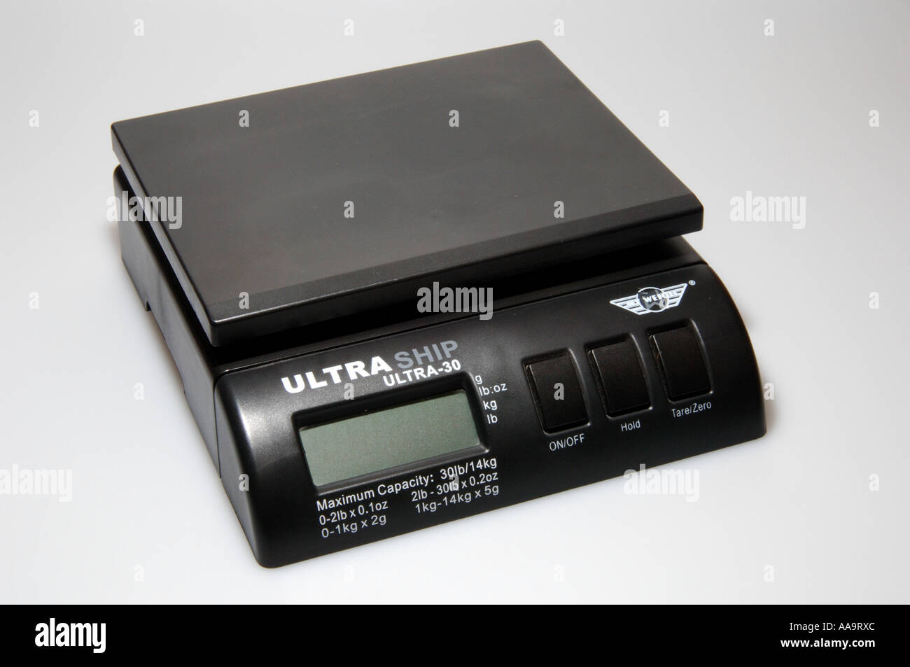 Black electronic postage scales on a white background Stock Photo - Alamy