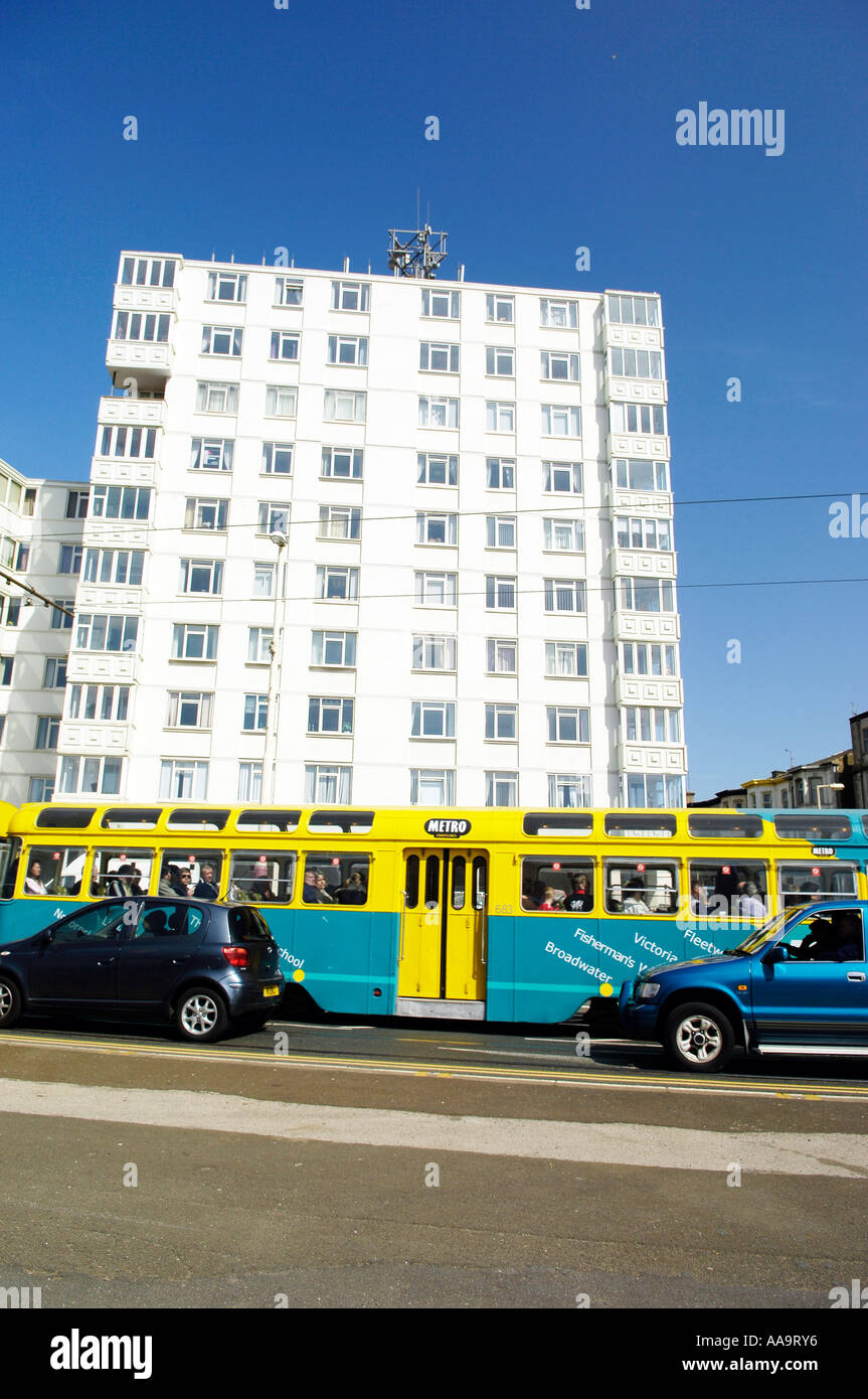 Blackpool heritage tram passing residential tower block Stock Photo - Alamy