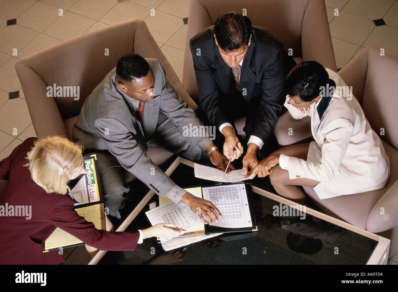 Team business executives discussing desk hi-res stock photography and ...