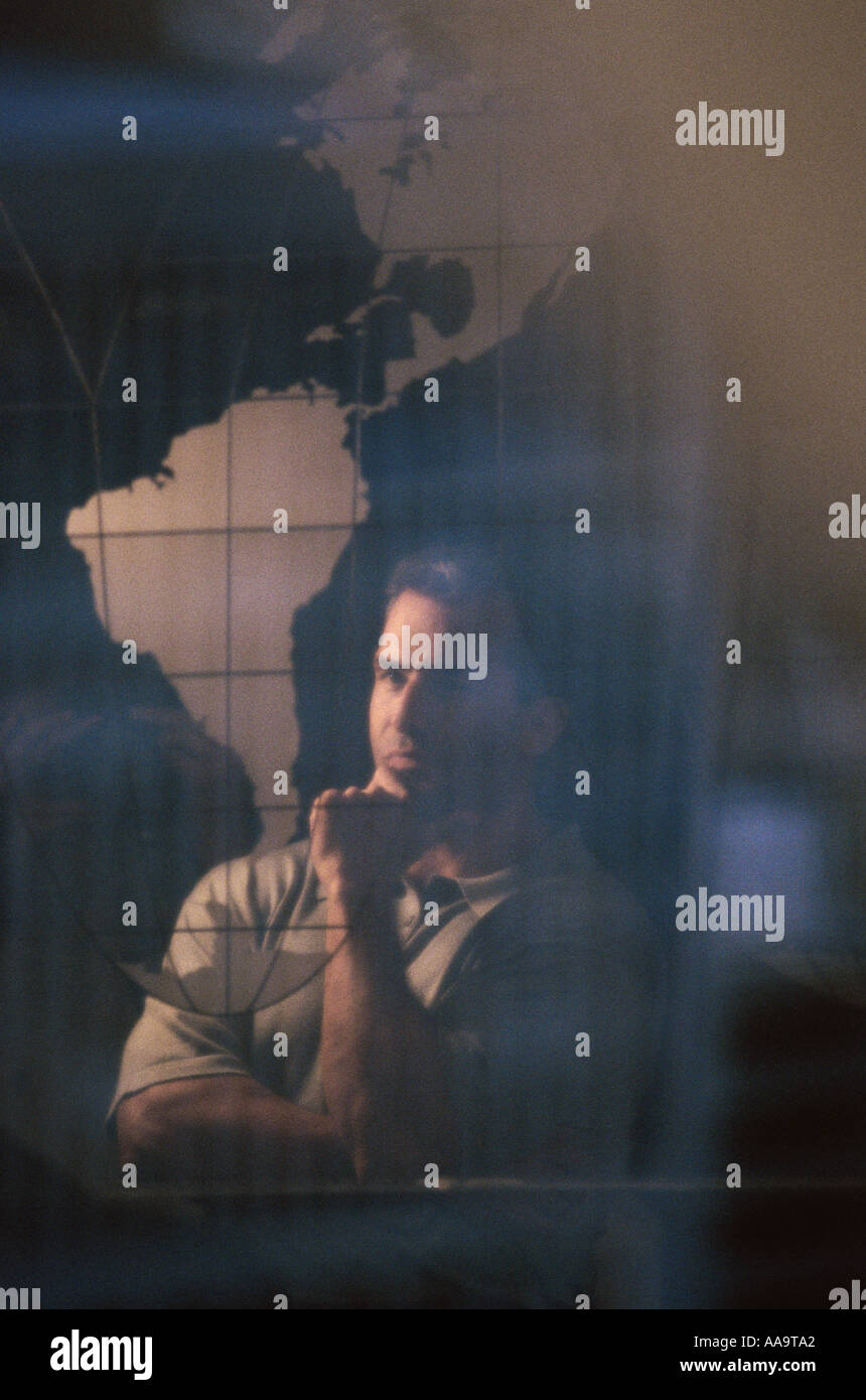 Reflection of a man in glass Stock Photo - Alamy
