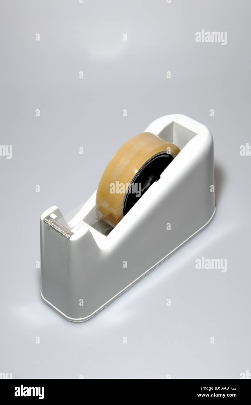 sticky tape dispenser on white background Stock Photo - Alamy