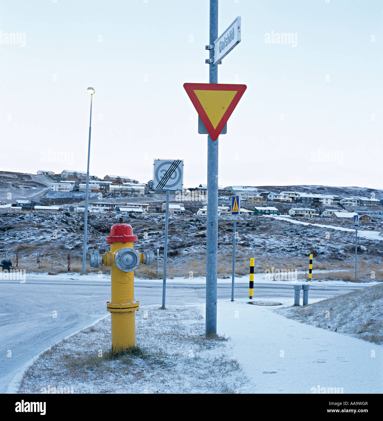 View of an american style fire water hydrant road signs snow covered ...