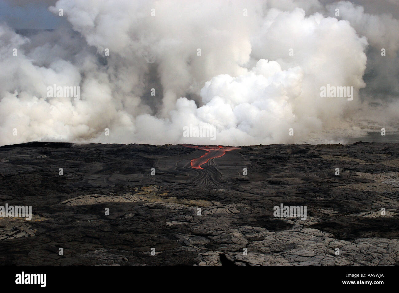 Lava flowing into the Pacific Ocean Volcanoes National Park Big Island ...