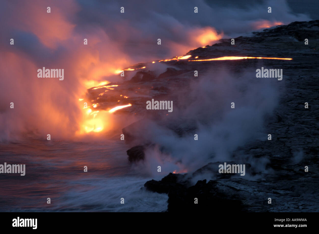 Lava flowing into the Pacific Ocean Volcanoes National Park Big Island ...