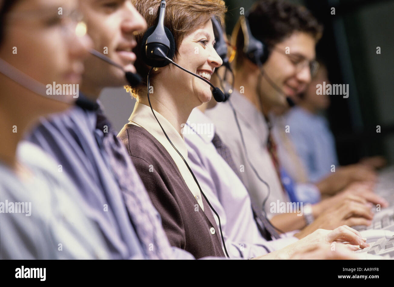 Cheerful customer service representatives hi-res stock photography and ...